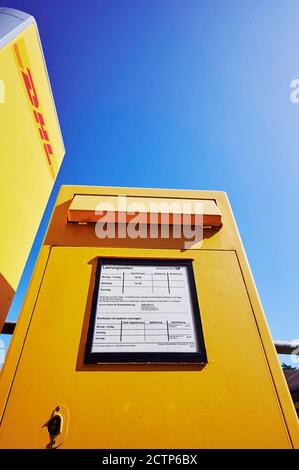 Yellow letterbox from Deutsche Post, Germany Stock Photo - Alamy