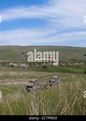 Colas Rail Class 70 70801 with train of ballast wagons at Kings Sutton ...