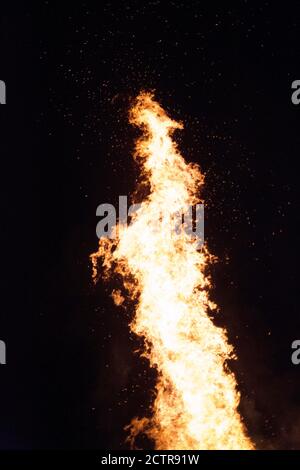 Flaming Embers spreading from Bonfire at Night Stock Photo - Alamy