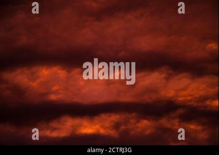 Mammato-cumulus, mamma clouds, hanging from the underside of a ...