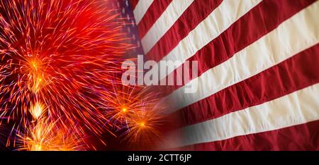 American flag at night with fireworks exploding in the air above Stock ...