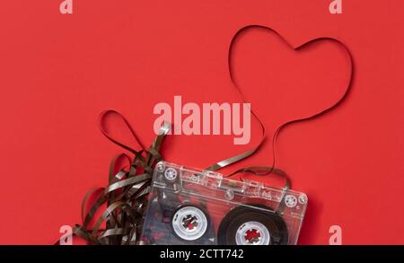 Old Audio Cassette with a Red Heart on the Square Paper Background ...