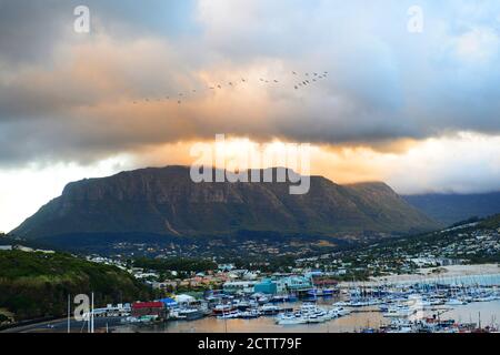 A view of Hout Bay and the mountains behind Stock Photo - Alamy