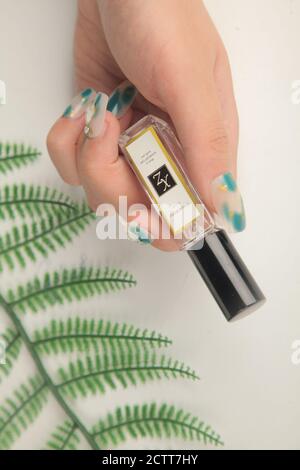Nail polish with flowers Stock Photo - Alamy