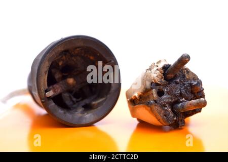 Electric plug damaged by overheating image Stock Photo - Alamy