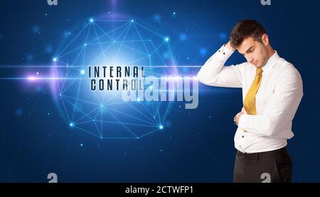 Businessman thinking about security solutions with INTERNAL CONTROL ...