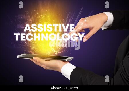 Close-up of a touchscreen with ASSISTIVE TECHNOLOGY inscription ...