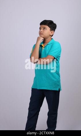Thinking indian child deep in thought concept for confusion ...