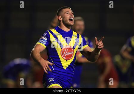 Warrington Wolves' Danny Walker (L) celebrates with teammates after ...