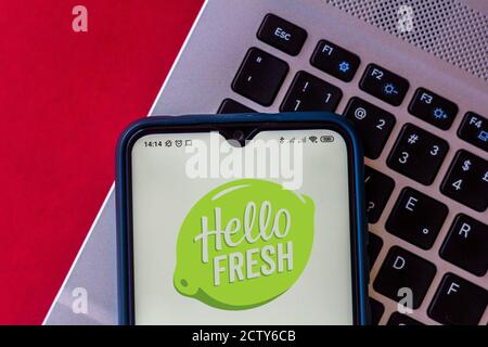 In this photo illustration the HelloFresh logo seen displayed on a ...