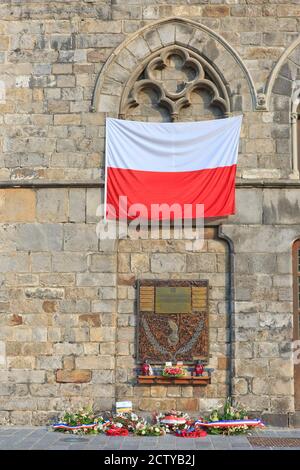 Closeup of polish national flag with eagle emblem on ship in marine ...