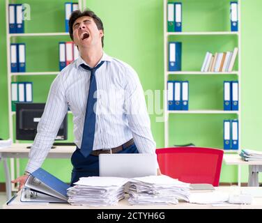 The frustrated businessman stressed from excessive work Stock Photo - Alamy