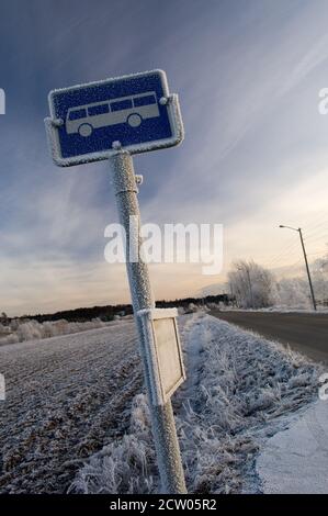 Frosty bus stop sign in Norway Stock Photo - Alamy