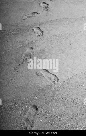 A vertical shot of the grey sand texture at the beach Stock Photo - Alamy