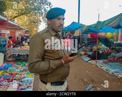 Indian police with walkie talkie Stock Photo - Alamy