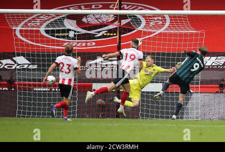 Sheffield United's Patrick Bamford (right) replaces team-mate Danny ...