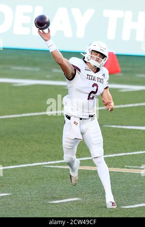Texas State quarterback Brady McBride (2) warms up before an NCAA ...