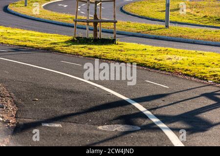 Curvy bike and walking path aling a road Stock Photo - Alamy