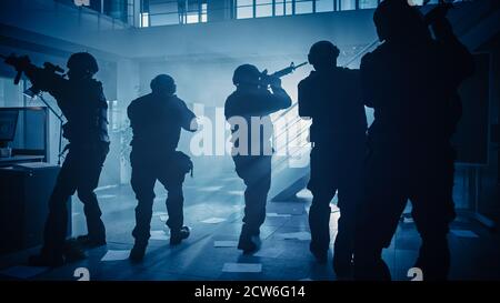 Close Up Portraits of Masked Squad of Armed SWAT Police Officers Storm ...