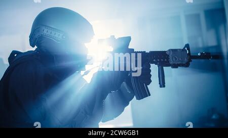 Close Up Portrait of Masked Squad Member of Armed SWAT Police Officers ...