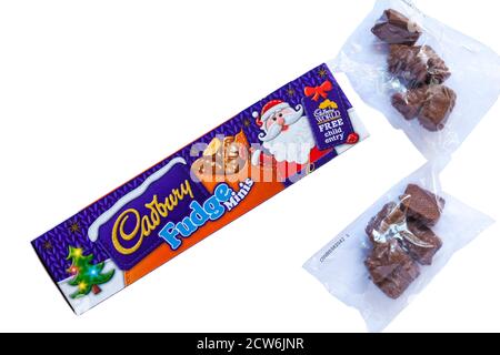 box of Cadbury Fudge minis opened to show contents isolated on white ...