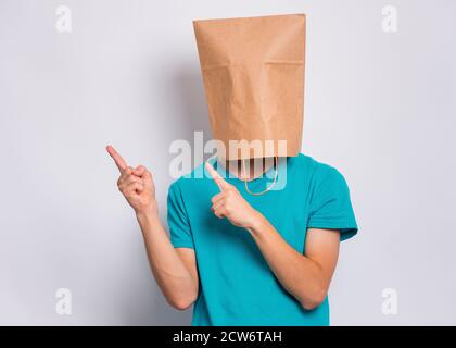 Boy with paper bag over head Stock Photo - Alamy