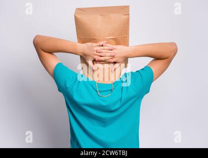 Boy with paper bag over head Stock Photo - Alamy