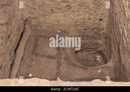 Basin feature alongside an ancient Mosaic in the basement of The Church ...