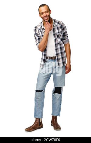 Young man wearing glasses over yellow background looking at the camera ...