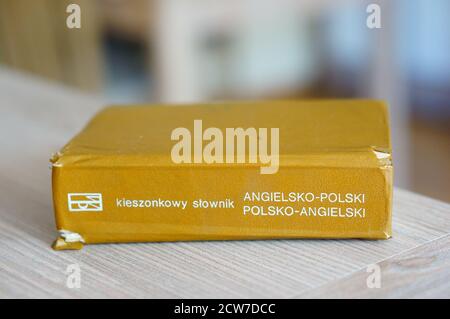 PO, POLAND - Aug 29, 2015: Polish and English dictionary laying on a ...