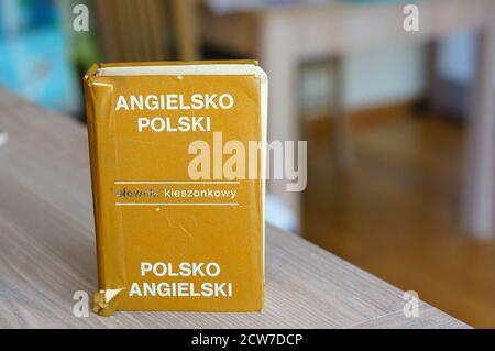 PO, POLAND - Aug 29, 2015: Polish and English dictionary laying on a ...