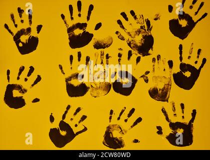 creative children black handprints painting Stock Photo - Alamy
