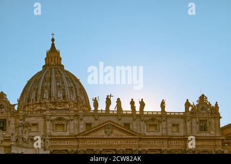 The sun sets behind Vatican City in Rome, Italy Stock Photo - Alamy