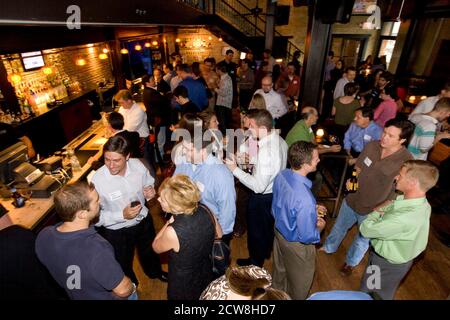 People mingling at a cocktail party Stock Photo - Alamy
