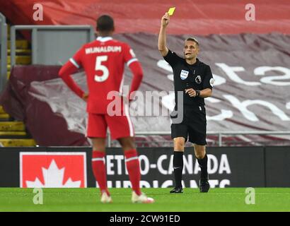 Referee Craig Pawson shows Liverpool's Amara Nallo a red card during ...