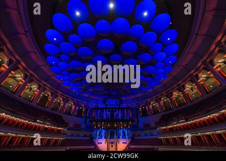 Acoustic diffusing discs (lit in purple) hanging from the roof of the ...
