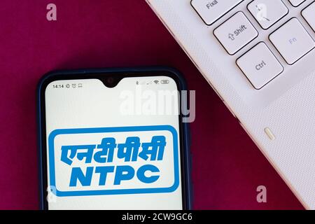 In this photo illustration, the NTPC Limited logo is seen displayed on ...