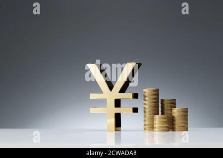 The symbols and base of gold COINS Stock Photo - Alamy