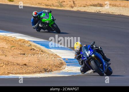 Motorbike racing in circuit. Photographed in Israel Stock Photo - Alamy