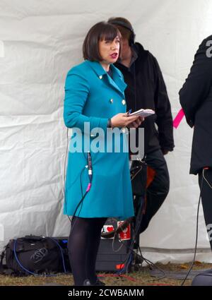 Beth Rigby, SKY political editor looks at her phone in Downing Street ...