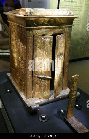 Gilded wooden shrine with depictions of Tutankhamun and Ankhesenamun ...