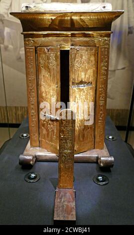 Gilded wooden shrine with depictions of Tutankhamun and Ankhesenamun ...