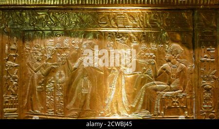Gilded wooden shrine with depictions of Tutankhamun and Ankhesenamun ...