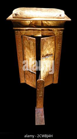 Gilded wooden shrine with depictions of Tutankhamun and Ankhesenamun ...