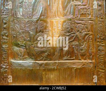 Gilded wooden shrine with depictions of Tutankhamun and Ankhesenamun ...