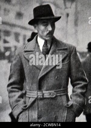 This black-and-white portrait photograph from a bygone era captures an ...