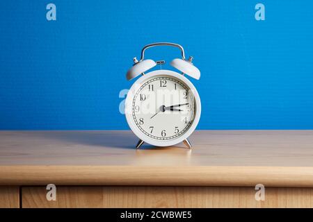 Alarm Clock on a Shelf Stock Photo - Alamy