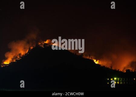 CALISTOGA, CA - SEPTEMBER 28: Wildfire flames from the Glass Fire ...