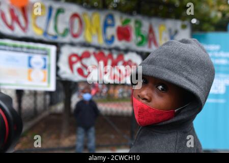 Elementary school students are welcomed back to P.S. 188 as the city's ...