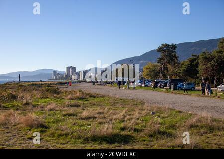 People enjoying the walking trails at Ambleside Beach in West Vancouver ...